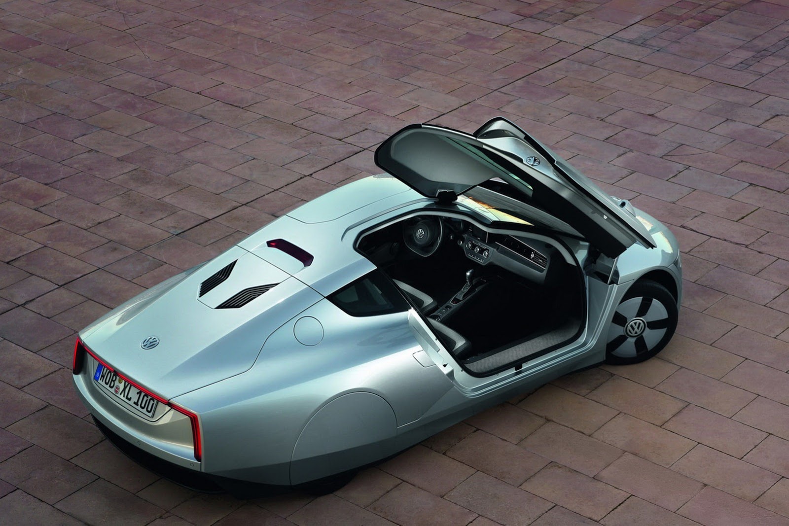 The Volkswagen XL1 production car gets 261 mpg with TDI and electric ...